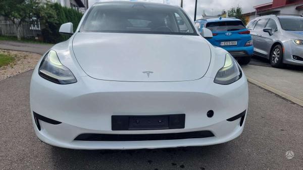 White Tesla Model Y 2024 in Alytus, with an engine capacity of 0.00 L and mileage of 41 thousand km for 20350 €, photo 7 on AUTOMOTO.COM.LV