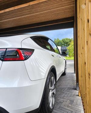 Balts Tesla Model Y 2024 Viļņa, ar dzinēja tilpumu 0.00 L un nobraukumu 104 tūkst. km par 33500 €, foto 10 vietnē AUTOMOTO.COM.LV