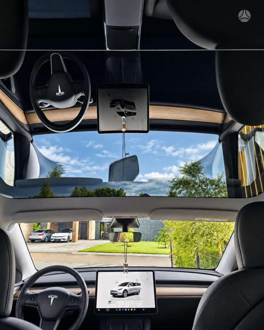 Balts Tesla Model Y 2024 Viļņa, ar dzinēja tilpumu 0.00 L un nobraukumu 104 tūkst. km par 33500 €, foto 12 vietnē AUTOMOTO.COM.LV