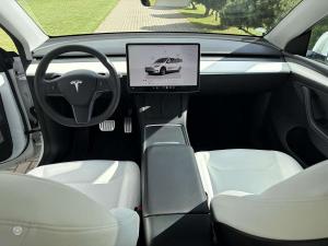 White Tesla Model Y 2024 in Alytus, with an engine capacity of 0.00 L and mileage of 25 thousand km for 35600 €, photo 17 on AUTOMOTO.COM.LV