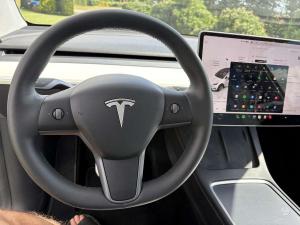 White Tesla Model Y 2024 in Alytus, with an engine capacity of 0.00 L and mileage of 25 thousand km for 35600 €, photo 19 on AUTOMOTO.COM.LV