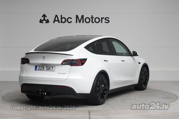 White Tesla Model Y 2024 in Tallinn, with an engine capacity of 0.00 L and mileage of 54 thousand km for 41890 €, photo 5 on AUTOMOTO.COM.LV