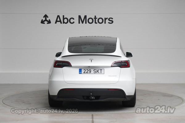 White Tesla Model Y 2024 in Tallinn, with an engine capacity of 0.00 L and mileage of 54 thousand km for 41890 €, photo 6 on AUTOMOTO.COM.LV