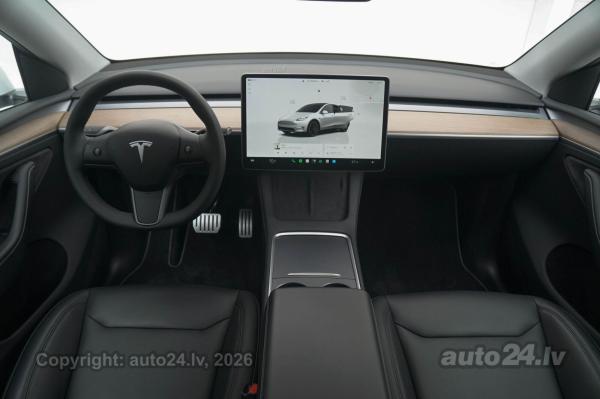 White Tesla Model Y 2024 in Tallinn, with an engine capacity of 0.00 L and mileage of 54 thousand km for 41890 €, photo 8 on AUTOMOTO.COM.LV