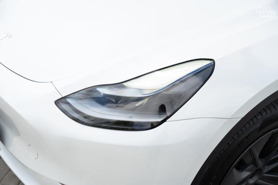 White Tesla Model Y 2025 in Vilnius, with an engine capacity of 0.00 L and mileage of 3 thousand km for 44500 €, photo 10 on AUTOMOTO.COM.LV