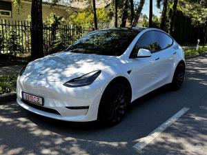 Balts Tesla Model Y 2025 Viļņa, ar dzinēja tilpumu 0.00 L un nobraukumu 18 tūkst. km par 39930 €, foto  vietnē AUTOMOTO.COM.LV