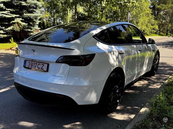 Balts Tesla Model Y 2025 Viļņa, ar dzinēja tilpumu 0.00 L un nobraukumu 18 tūkst. km par 39930 €, foto 5 vietnē AUTOMOTO.COM.LV
