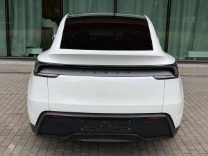 White Tesla Model Y 2025 in Kaunas, with an engine capacity of 0.00 L and mileage of 40 thousand km for 40414 €, photo 6 on AUTOMOTO.COM.LV
