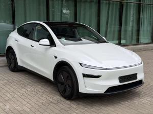 White Tesla Model Y 2025 in Kaunas, with an engine capacity of 0.00 L and mileage of 40 thousand km for 40414 €, photo 15 on AUTOMOTO.COM.LV