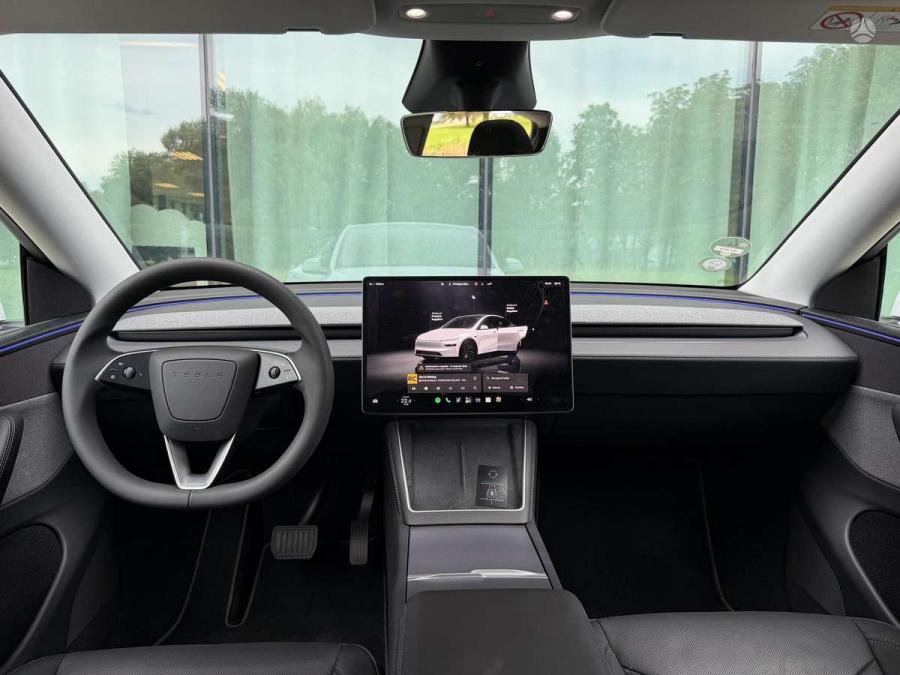 White Tesla Model Y 2025 in Kaunas, with an engine capacity of 0.00 L and mileage of 40 thousand km for 40414 €, photo 19 on AUTOMOTO.COM.LV