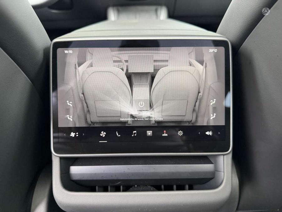 White Tesla Model Y 2025 in Kaunas, with an engine capacity of 0.00 L and mileage of 40 thousand km for 40414 €, photo 28 on AUTOMOTO.COM.LV