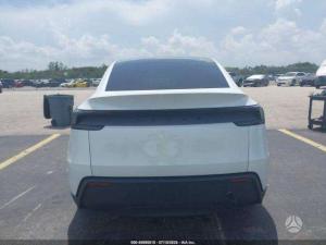 White Tesla Model Y 2026 in Klaipeda, with an engine capacity of 0.00 L and mileage of 13 thousand km for 18500 €, photo 16 on AUTOMOTO.COM.LV