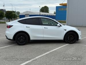 Balts Tesla Model Y 2021 Tallina, ar dzinēja tilpumu 0.00 L un nobraukumu 133 tūkst. km par 28999 €, foto 8 vietnē AUTOMOTO.COM.LV