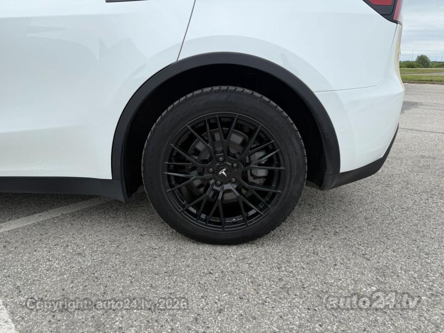 Balts Tesla Model Y 2021 Tallina, ar dzinēja tilpumu 0.00 L un nobraukumu 133 tūkst. km par 28999 €, foto 19 vietnē AUTOMOTO.COM.LV