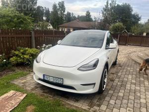 White Tesla Model Y 2021 in Riga, with an engine capacity of 0.00 L and mileage of 193 thousand km for 26000 €, photo 8 on AUTOMOTO.COM.LV