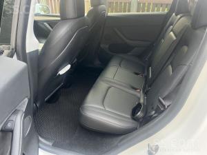 White Tesla Model Y 2021 in Riga, with an engine capacity of 0.00 L and mileage of 193 thousand km for 26000 €, photo 10 on AUTOMOTO.COM.LV