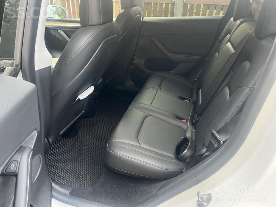 White Tesla Model Y 2021 in Riga, with an engine capacity of 0.00 L and mileage of 193 thousand km for 26000 €, photo 10 on AUTOMOTO.COM.LV