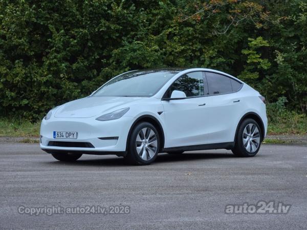 White Tesla Model Y 2021 in Parnu, with an engine capacity of 0.00 L and mileage of 127 thousand km for 28990 €, photo 4 on AUTOMOTO.COM.LV