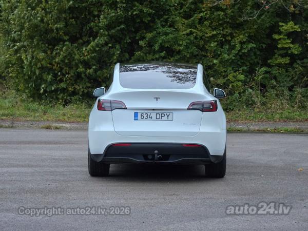 White Tesla Model Y 2021 in Parnu, with an engine capacity of 0.00 L and mileage of 127 thousand km for 28990 €, photo 6 on AUTOMOTO.COM.LV