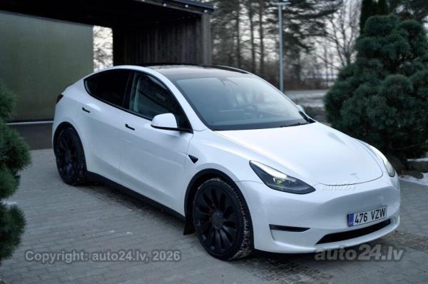 White Tesla Model Y 2022 in Tallinn, with an engine capacity of 0.00 L and mileage of 79 thousand km for 35900 €, photo 2 on AUTOMOTO.COM.LV