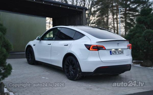 White Tesla Model Y 2022 in Tallinn, with an engine capacity of 0.00 L and mileage of 79 thousand km for 35900 €, photo 4 on AUTOMOTO.COM.LV