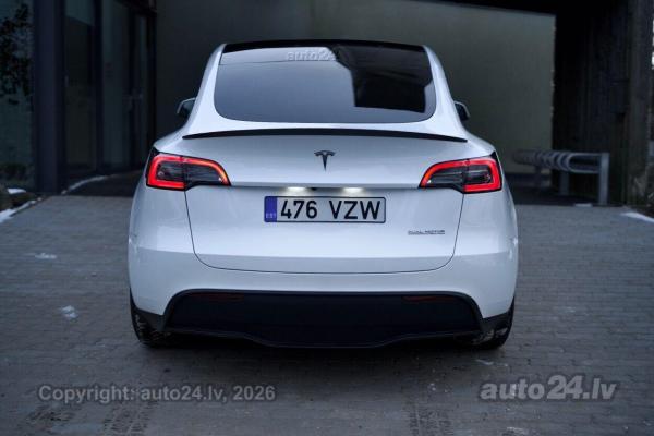White Tesla Model Y 2022 in Tallinn, with an engine capacity of 0.00 L and mileage of 79 thousand km for 35900 €, photo 5 on AUTOMOTO.COM.LV