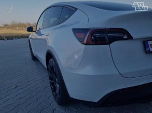 White Tesla Model Y 2022 in Siauliai, with an engine capacity of 0.00 L and mileage of 100 thousand km for 27500 €, photo 11 on AUTOMOTO.COM.LV