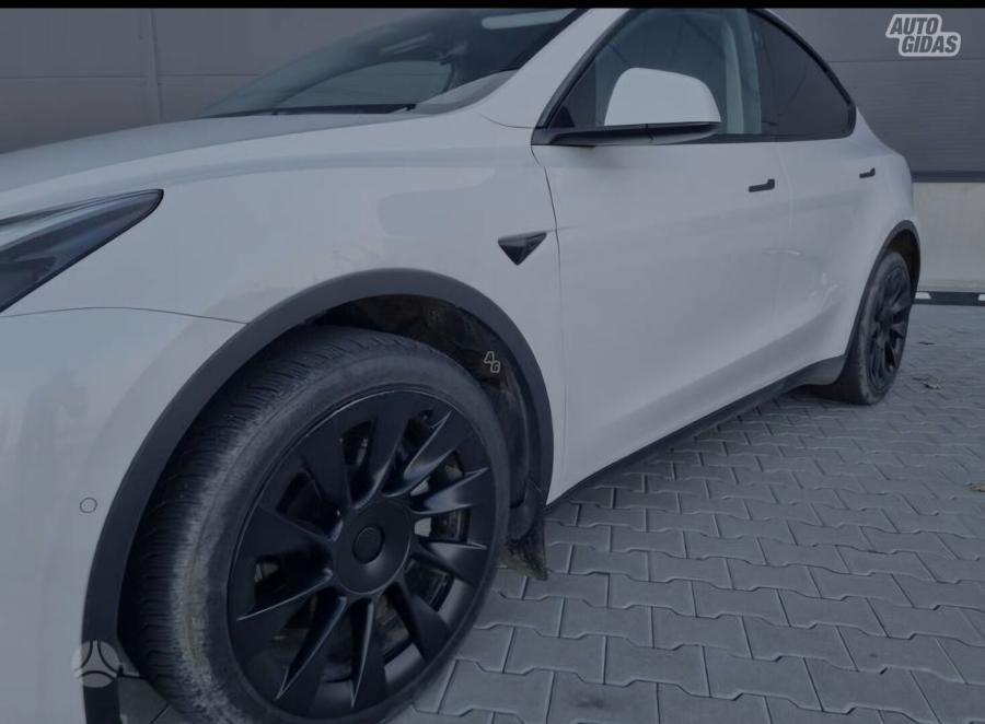 White Tesla Model Y 2022 in Siauliai, with an engine capacity of 0.00 L and mileage of 100 thousand km for 27500 €, photo 14 on AUTOMOTO.COM.LV