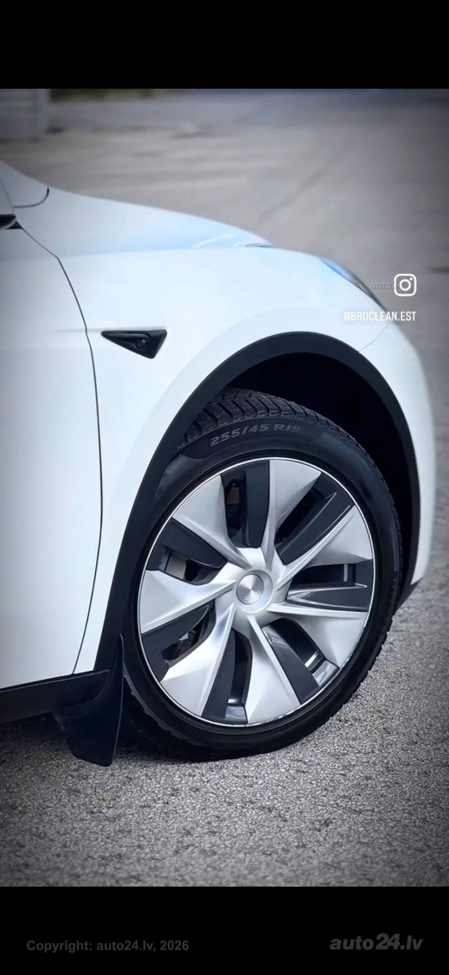 White Tesla Model Y 2022 in Tallinn, with an engine capacity of 0.00 L and mileage of 72 thousand km for 34000 €, photo 10 on AUTOMOTO.COM.LV