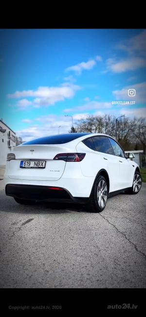 White Tesla Model Y 2022 in Tallinn, with an engine capacity of 0.00 L and mileage of 72 thousand km for 34000 €, photo 11 on AUTOMOTO.COM.LV