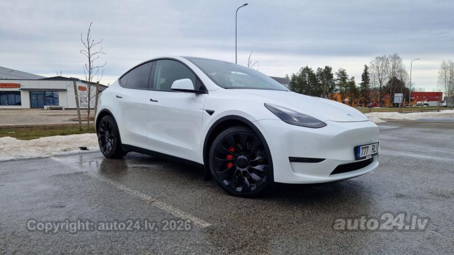 White Tesla Model Y 2022 in Parnu, with an engine capacity of 0.00 L and mileage of 56 thousand km for 37000 €, photo 1 on AUTOMOTO.COM.LV