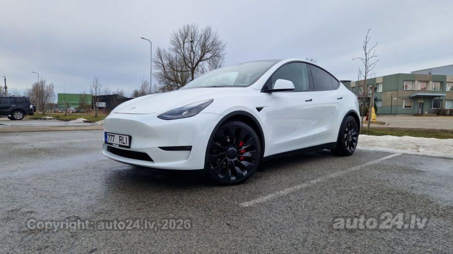 White Tesla Model Y 2022 in Parnu, with an engine capacity of 0.00 L and mileage of 56 thousand km for 37000 €, photo 2 on AUTOMOTO.COM.LV