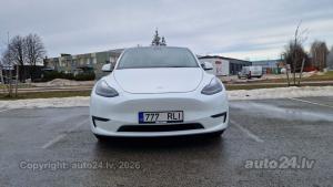 White Tesla Model Y 2022 in Parnu, with an engine capacity of 0.00 L and mileage of 56 thousand km for 37000 €, photo 3 on AUTOMOTO.COM.LV