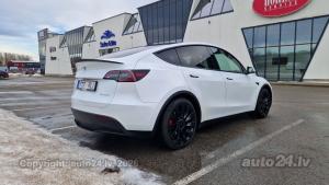White Tesla Model Y 2022 in Parnu, with an engine capacity of 0.00 L and mileage of 56 thousand km for 37000 €, photo 7 on AUTOMOTO.COM.LV