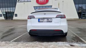 White Tesla Model Y 2022 in Parnu, with an engine capacity of 0.00 L and mileage of 56 thousand km for 37000 €, photo 8 on AUTOMOTO.COM.LV