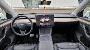White Tesla Model Y 2022 in Parnu, with an engine capacity of 0.00 L and mileage of 56 thousand km for 37000 €, photo 14 on AUTOMOTO.COM.LV
