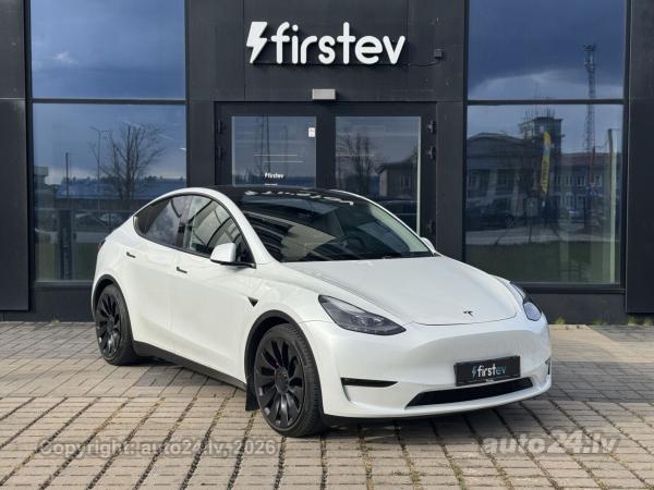 White Tesla Model Y 2022 in Tallinn, with an engine capacity of 0.00 L and mileage of 84 thousand km for 36990 €, photo 1 on AUTOMOTO.COM.LV