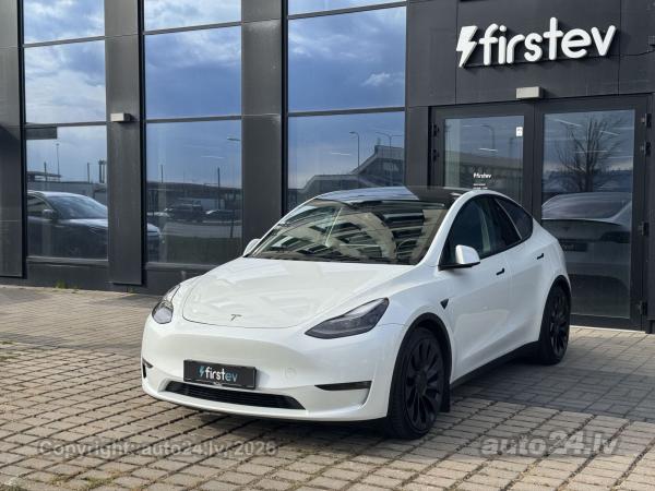 White Tesla Model Y 2022 in Tallinn, with an engine capacity of 0.00 L and mileage of 84 thousand km for 36990 €, photo 2 on AUTOMOTO.COM.LV