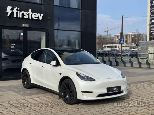 White Tesla Model Y 2022 in Tallinn, with an engine capacity of 0.00 L and mileage of 84 thousand km for 36990 €, photo 4 on AUTOMOTO.COM.LV