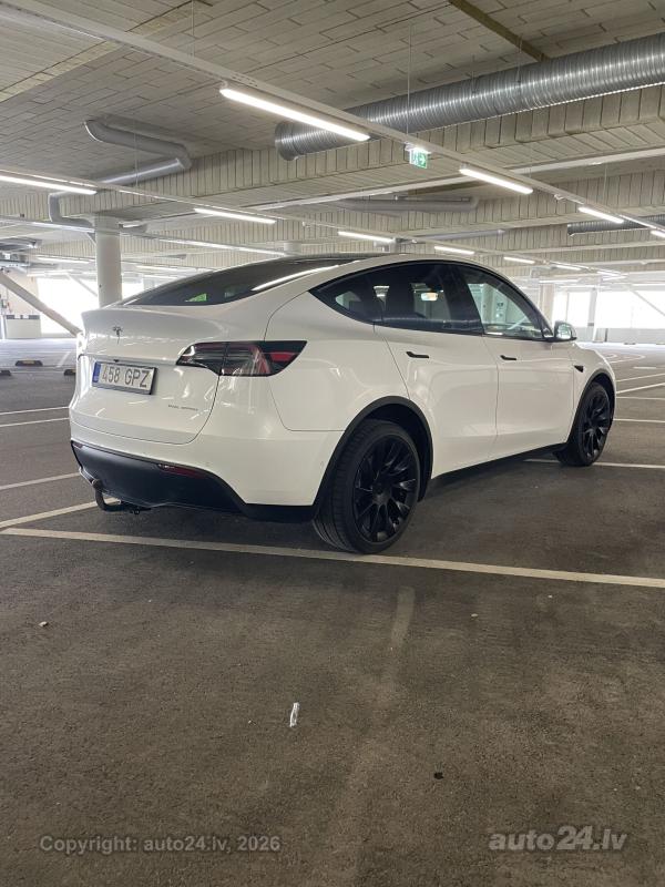 Balts Tesla Model Y 2022 Tallina, ar dzinēja tilpumu 0.00 L un nobraukumu 80 tūkst. km par 32500 €, foto 4 vietnē AUTOMOTO.COM.LV