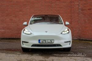 White Tesla Model Y 2022 in Tallinn, with an engine capacity of 0.00 L and mileage of 57 thousand km for 35490 €, photo 4 on AUTOMOTO.COM.LV