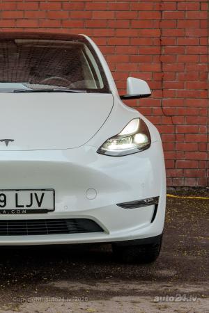 White Tesla Model Y 2022 in Tallinn, with an engine capacity of 0.00 L and mileage of 57 thousand km for 35490 €, photo 5 on AUTOMOTO.COM.LV