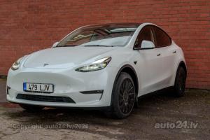 White Tesla Model Y 2022 in Tallinn, with an engine capacity of 0.00 L and mileage of 57 thousand km for 35490 €, photo 6 on AUTOMOTO.COM.LV