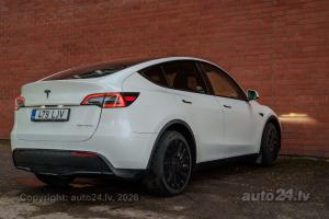 White Tesla Model Y 2022 in Tallinn, with an engine capacity of 0.00 L and mileage of 57 thousand km for 35490 €, photo 8 on AUTOMOTO.COM.LV