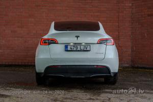 White Tesla Model Y 2022 in Tallinn, with an engine capacity of 0.00 L and mileage of 57 thousand km for 35490 €, photo 9 on AUTOMOTO.COM.LV