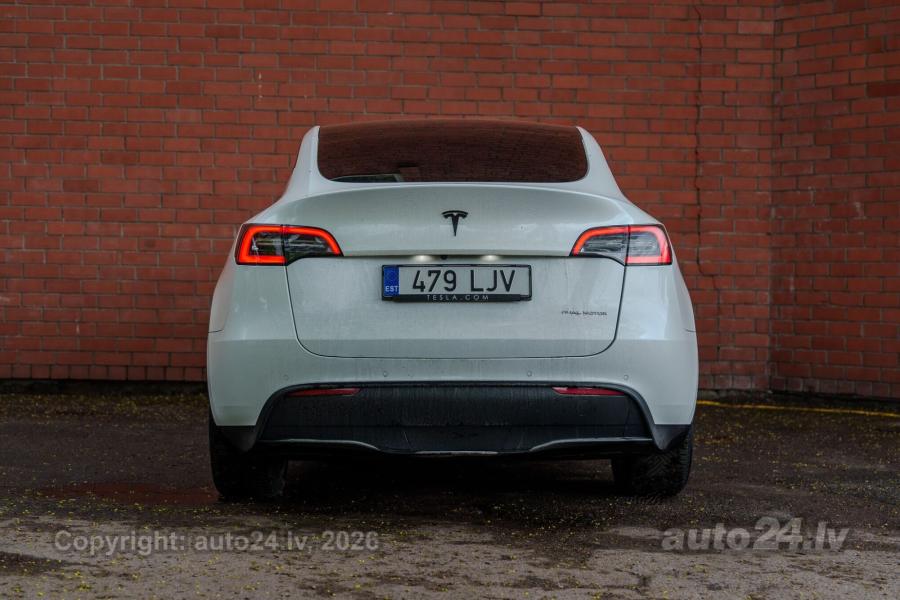 White Tesla Model Y 2022 in Tallinn, with an engine capacity of 0.00 L and mileage of 57 thousand km for 35490 €, photo 9 on AUTOMOTO.COM.LV