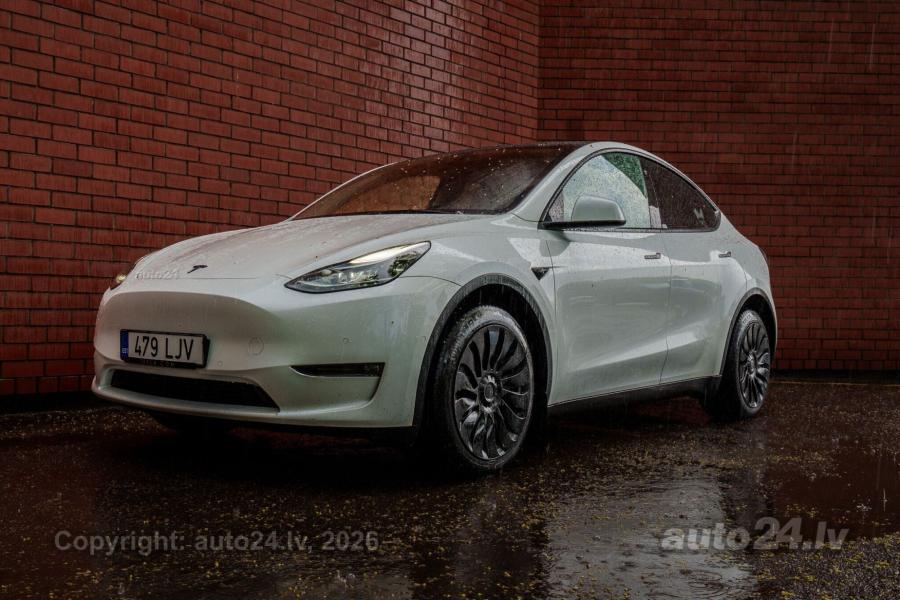 White Tesla Model Y 2022 in Tallinn, with an engine capacity of 0.00 L and mileage of 57 thousand km for 35490 €, photo 12 on AUTOMOTO.COM.LV