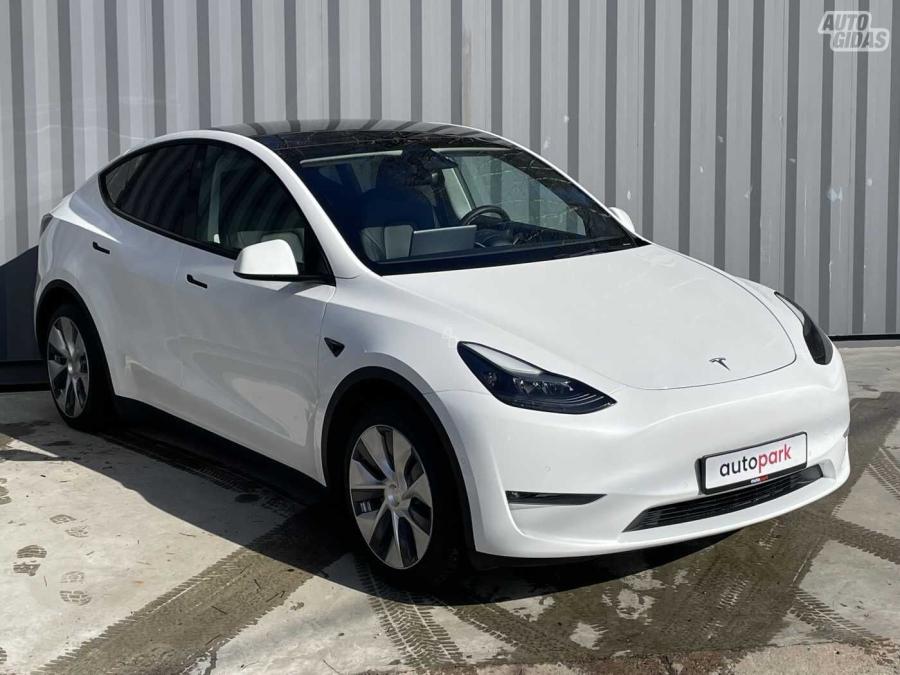 White Tesla Model Y 2022 in Vilnius, with an engine capacity of 0.00 L and mileage of 91 thousand km for 31500 €, photo 3 on AUTOMOTO.COM.LV