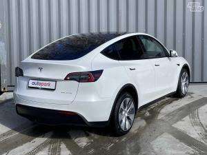 White Tesla Model Y 2022 in Vilnius, with an engine capacity of 0.00 L and mileage of 91 thousand km for 31500 €, photo 4 on AUTOMOTO.COM.LV