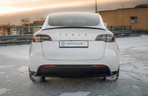 White Tesla Model Y 2022 in Riga, with an engine capacity of 0.00 L and mileage of 30 thousand km for 39000 €, photo 9 on AUTOMOTO.COM.LV